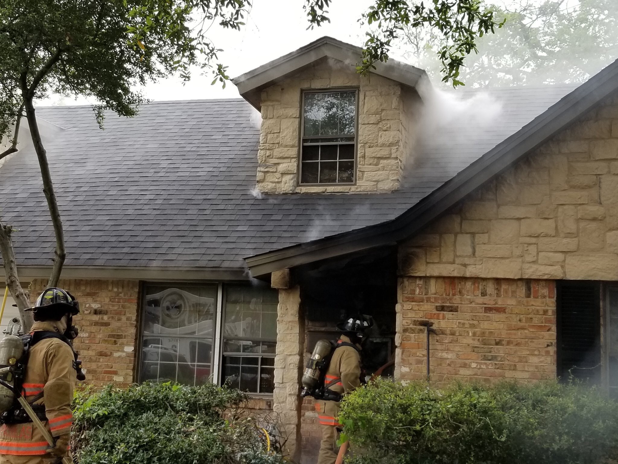 Irving firefighters working to contain a house fire | DFW Scanner